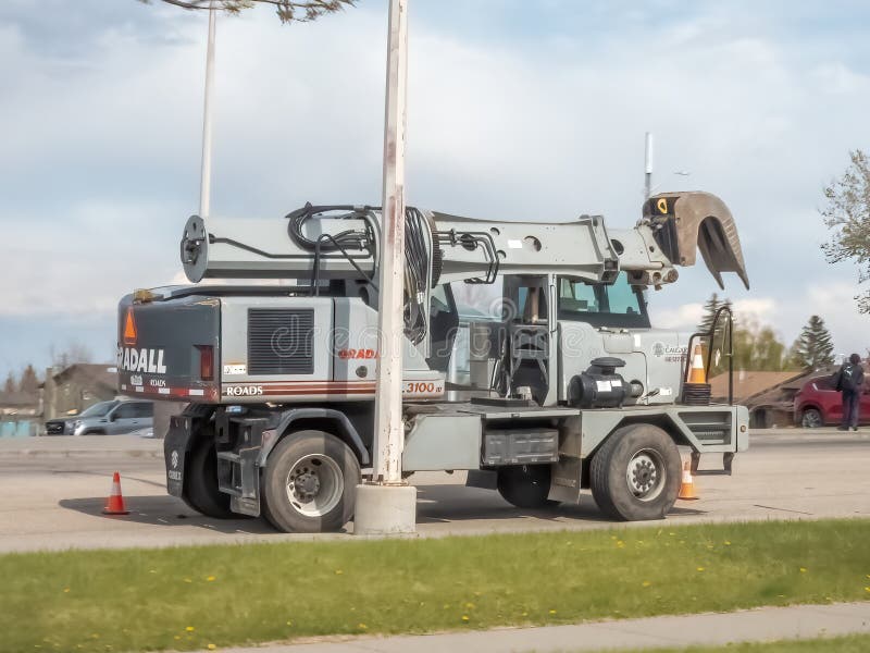 A Gradall XL3100, a Versatile Excavator, is Shown on a Calgary Road ...