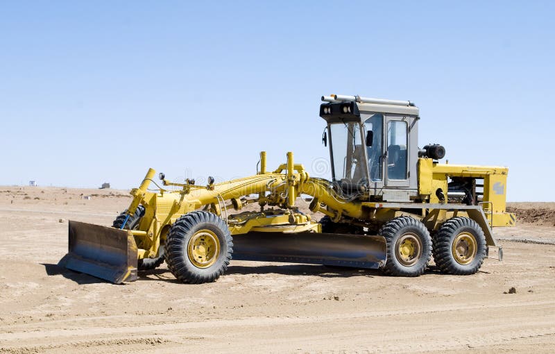 Grader and Excavator Construction Equipment Yard Stock Image - Image of ...