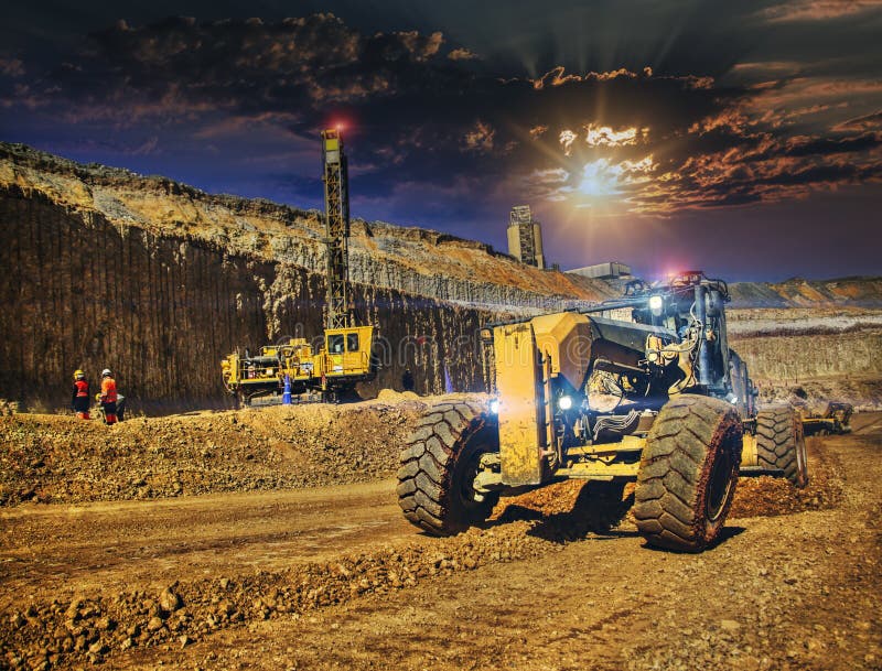 Grader and a Drilling Machine in a Diamond Mine Stock Photo - Image of ...