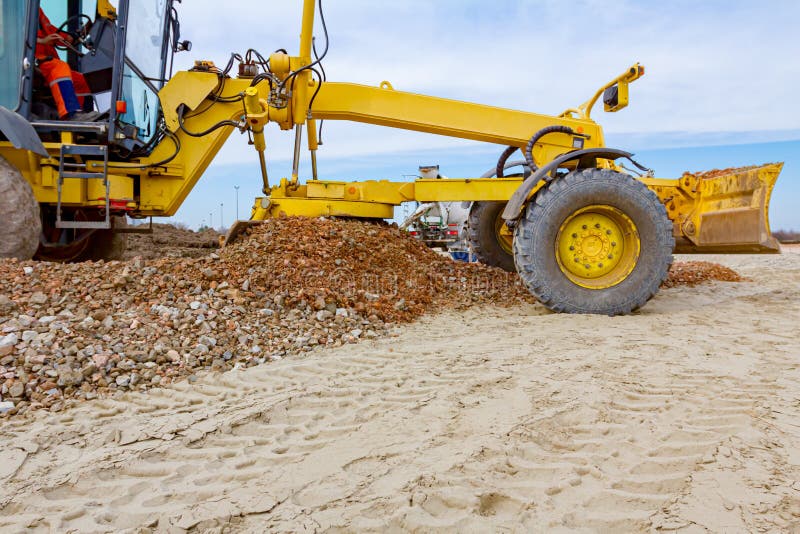 Grader is Leveling Ground at Construction Site Stock Photo - Image of ...