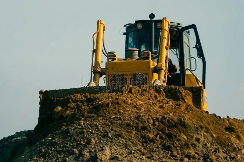 Grader Moves Clay In A Quarry. Clay Quarry Stock Image - Image of ...