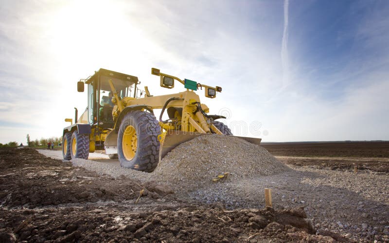 Grader Working on Gravel Leveling Stock Image - Image of engineering ...