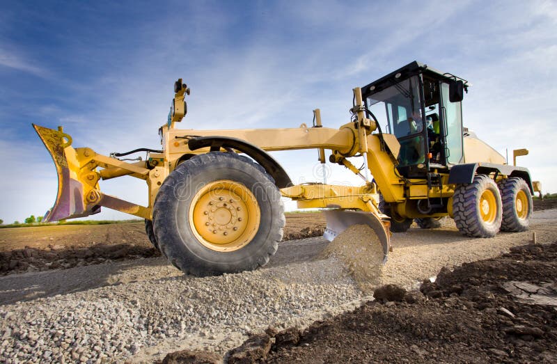 Grader Working on Gravel Leveling Stock Photo - Image of scoop, grade ...