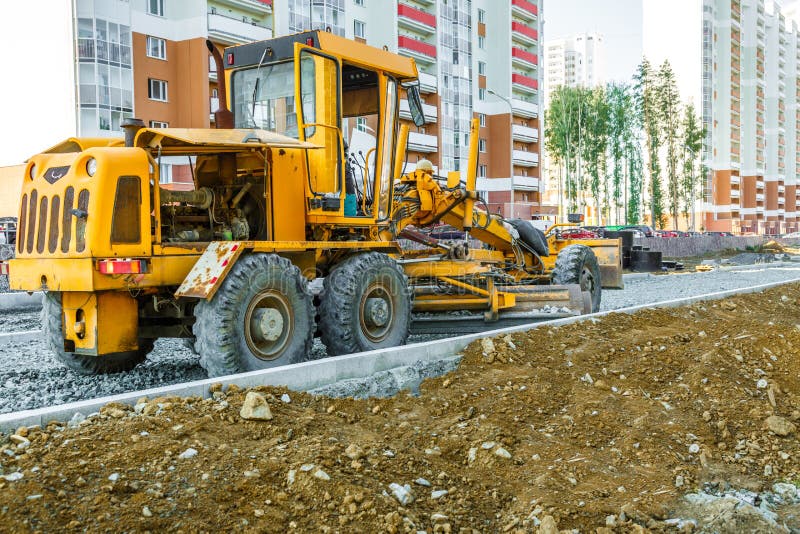 Grader Working Outside on Road Construction Stock Photo - Image of ...