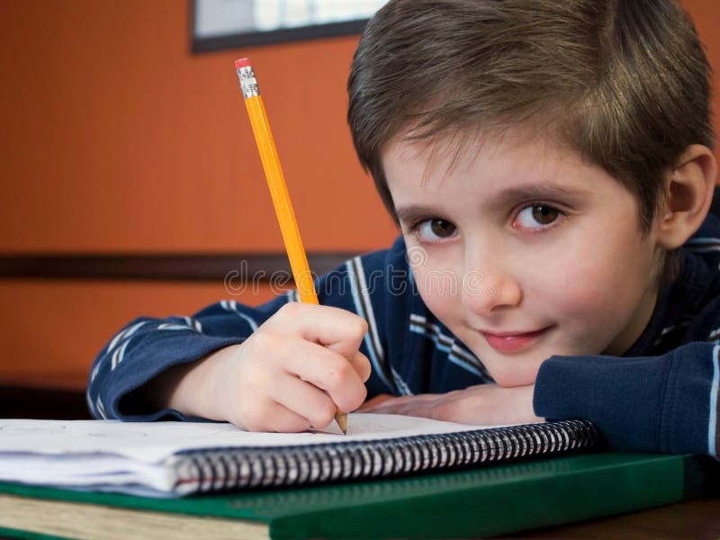 Gradeschool Kid Doing Homework Stock Image - Image of writing, pencil ...