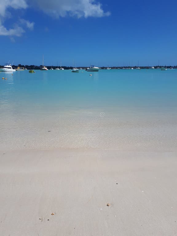 Gradient Sand and Qurquoise Sea with Blue Sky Stock Photo - Image of ...