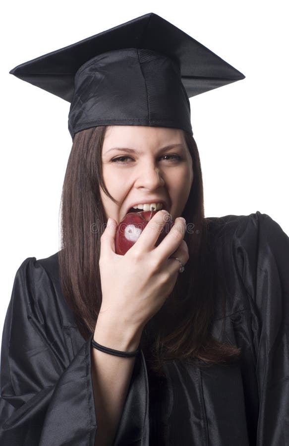 Graduate eating apple stock photo. Image of school, apple - 14934834