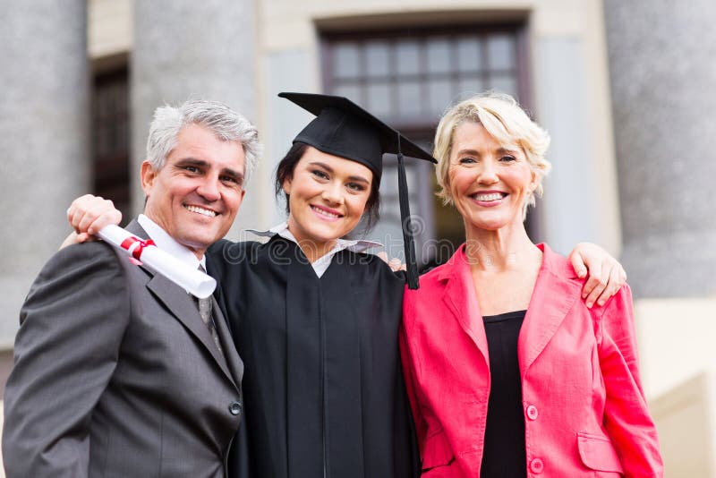 Graduate with parents stock photo. Image of gown, caucasian - 37037904