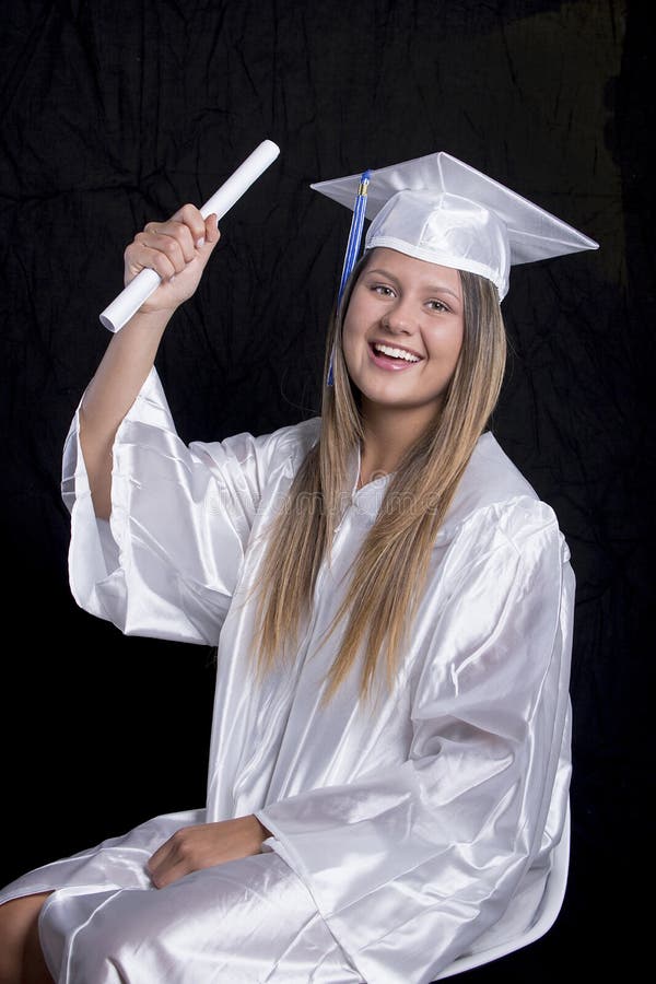 Graduate Raising Diploma in the Air Stock Image - Image of gown ...