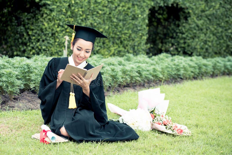 Graduate Reading Diary, Notebook in Her Hand Feeling Relaxing. Stock ...