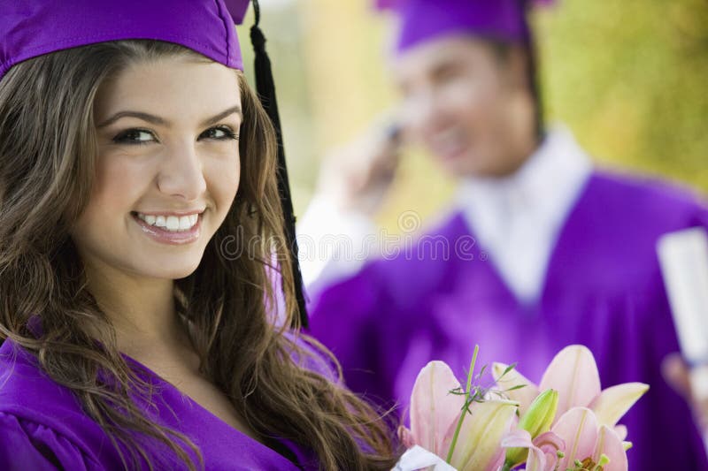 Graduate Student with Flower Bouquet Stock Photo - Image of looking ...