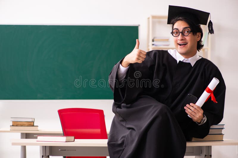 The Graduate Student in Front of Green Board Stock Photo - Image of ...
