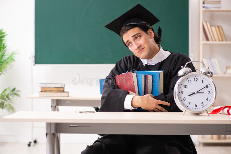 The Graduate Student in Front of Green Board Stock Photo - Image of ...