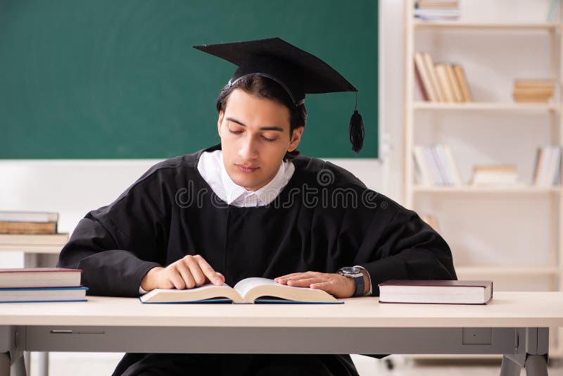 The Graduate Student in Front of Green Board Stock Photo - Image of ...