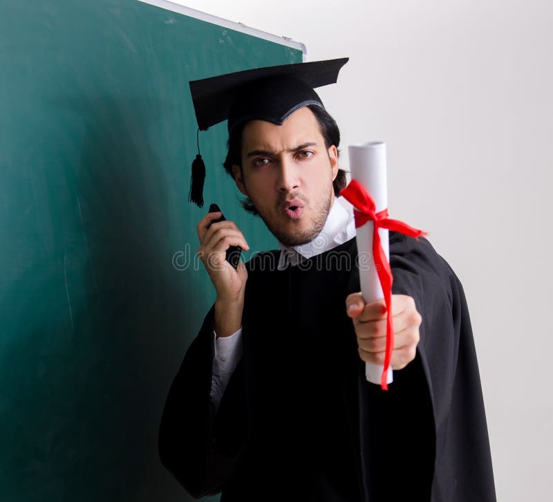 Graduate Student in Front of Green Board Stock Image - Image of happy ...