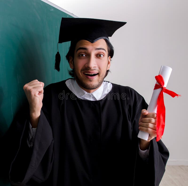 Graduate Student in Front of Green Board Stock Photo - Image of ...
