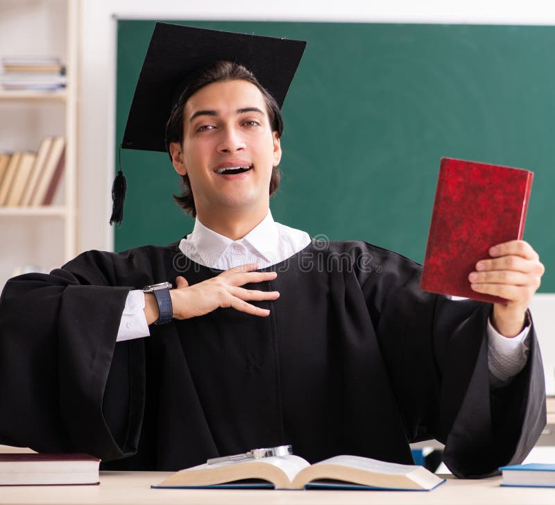 Graduate Student in Front of Green Board Stock Image - Image of ...