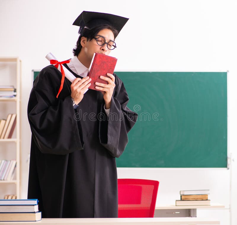 Graduate Student in Front of Green Board Stock Photo - Image of ...
