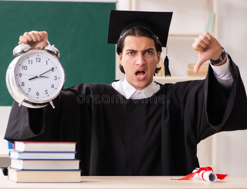 Graduate Student in Front of Green Board Stock Photo - Image of ...