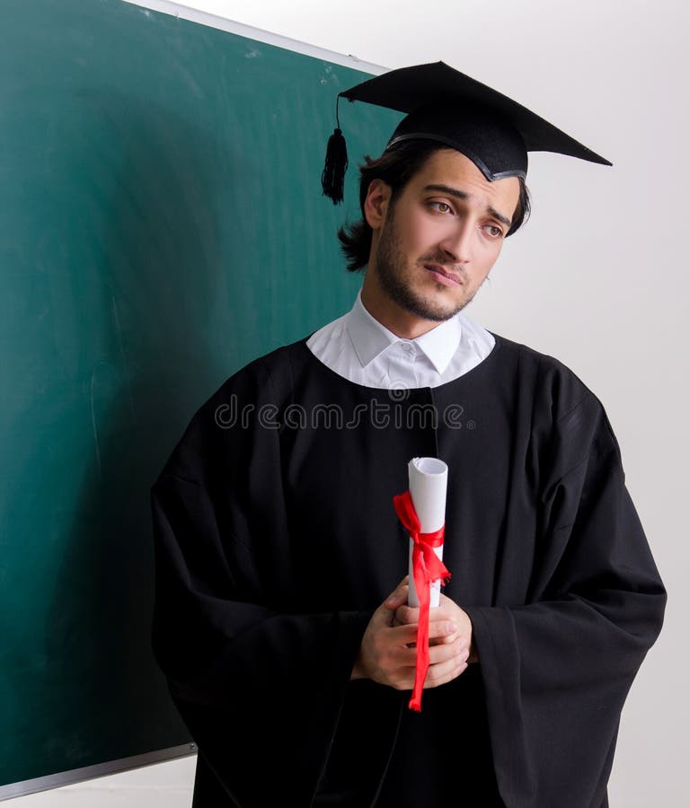 Graduate Student in Front of Green Board Stock Photo - Image of ...