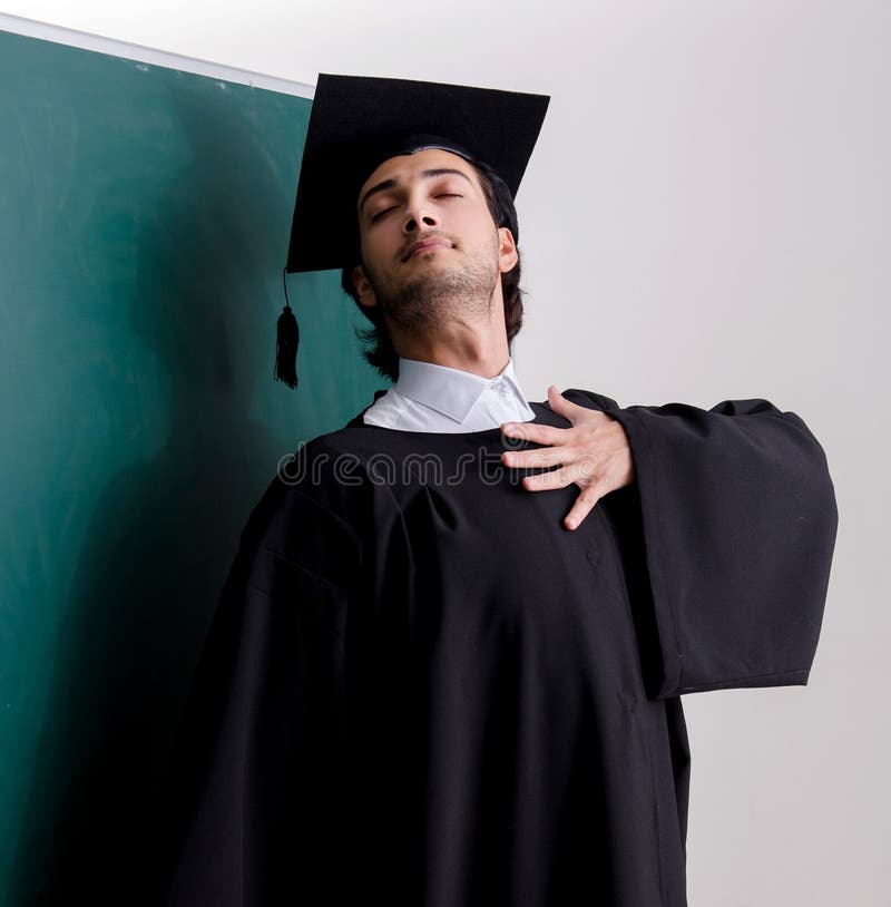 Graduate Student in Front of Green Board Stock Image - Image of hand ...