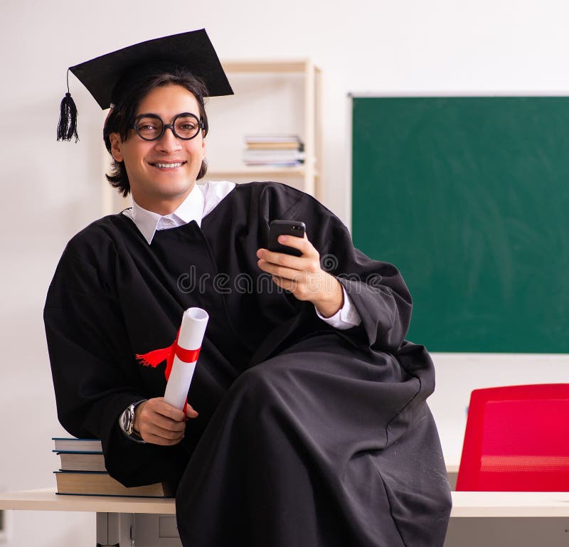 Graduate Student in Front of Green Board Stock Image - Image of ...