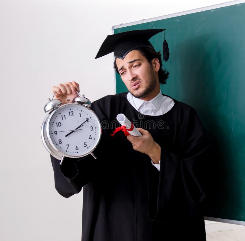 Graduate Student in Front of Green Board Stock Image - Image of ...