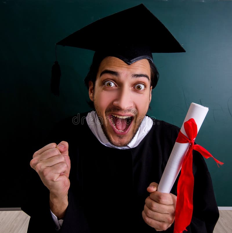 Graduate Student in Front of Green Board Stock Photo - Image of ...