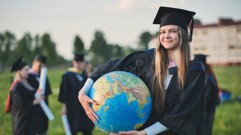 Graduate Student Girl Poses with a Globe in a Meadow. Stock Photo ...
