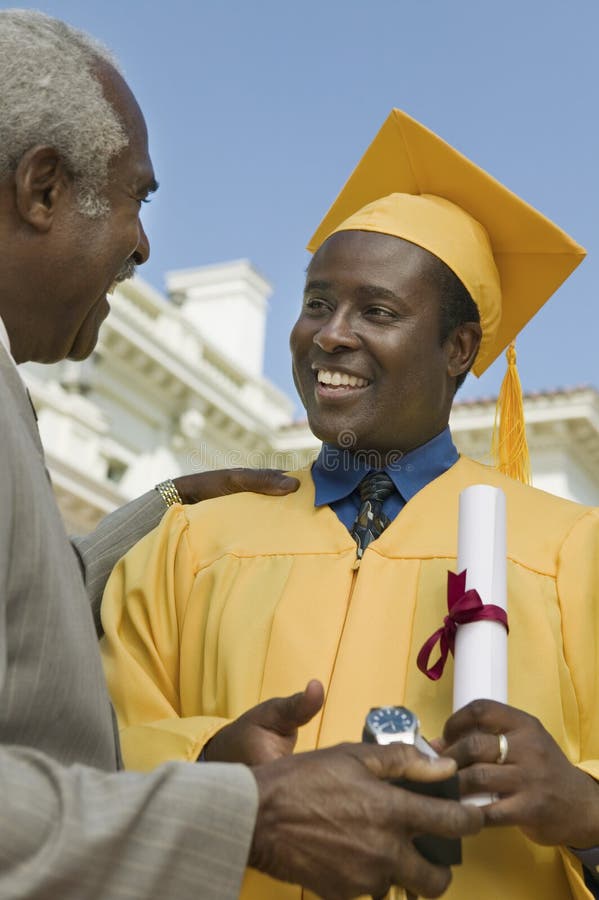 Graduate with Father Outside University Stock Photo - Image of outdoors ...