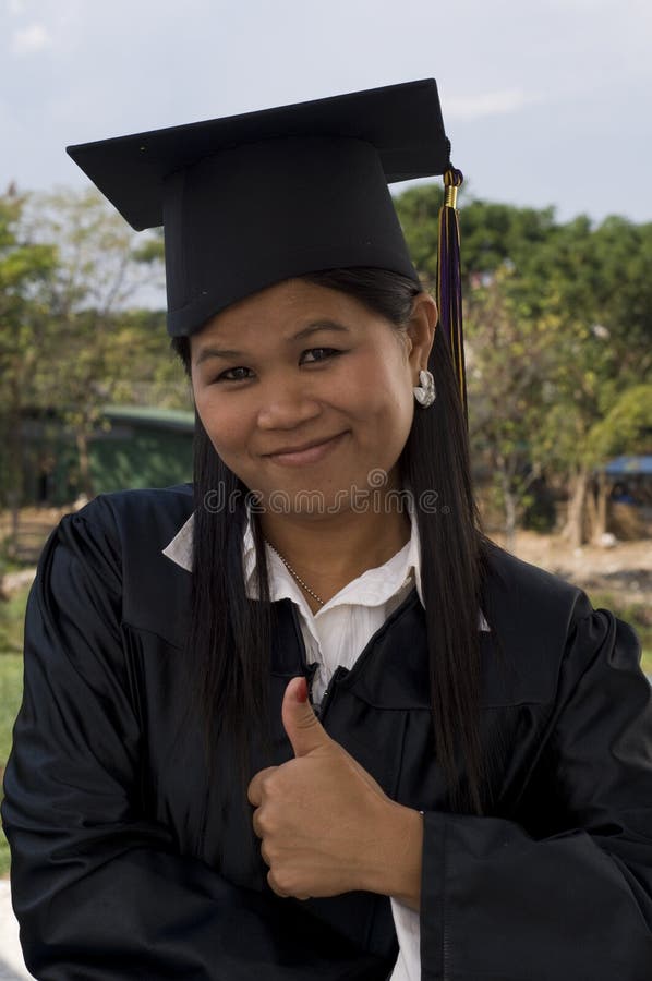 Graduate Student with Thumbs Up Hand Sign Stock Image - Image of ...