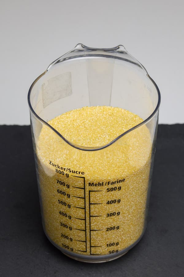 A Graduated Container of Corn Stock Photo - Image of measuring, tool ...