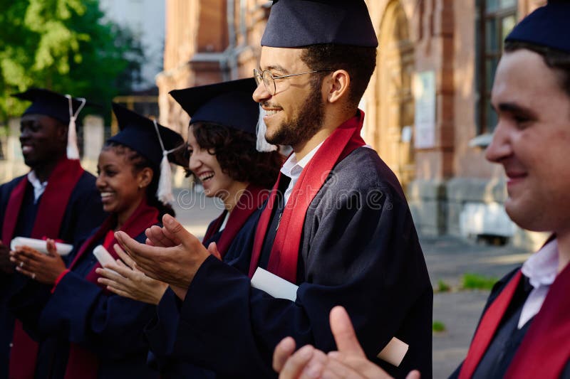 Graduated Students Clapping Hands Outdoors Stock Photo - Image of ...