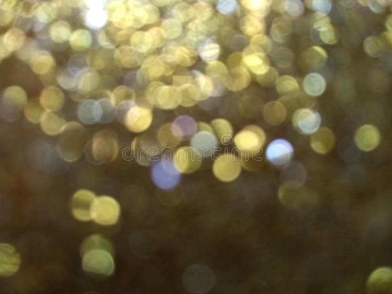 Graduated Yellow and Gold Blurred Lights Abstract Background with ...