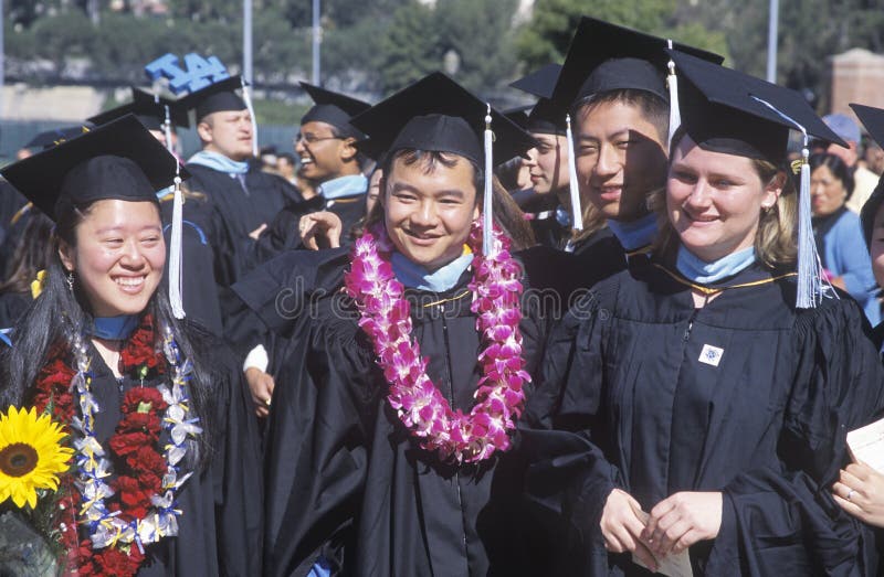 Graduates March Across the Stadium Field Editorial Stock Image - Image ...