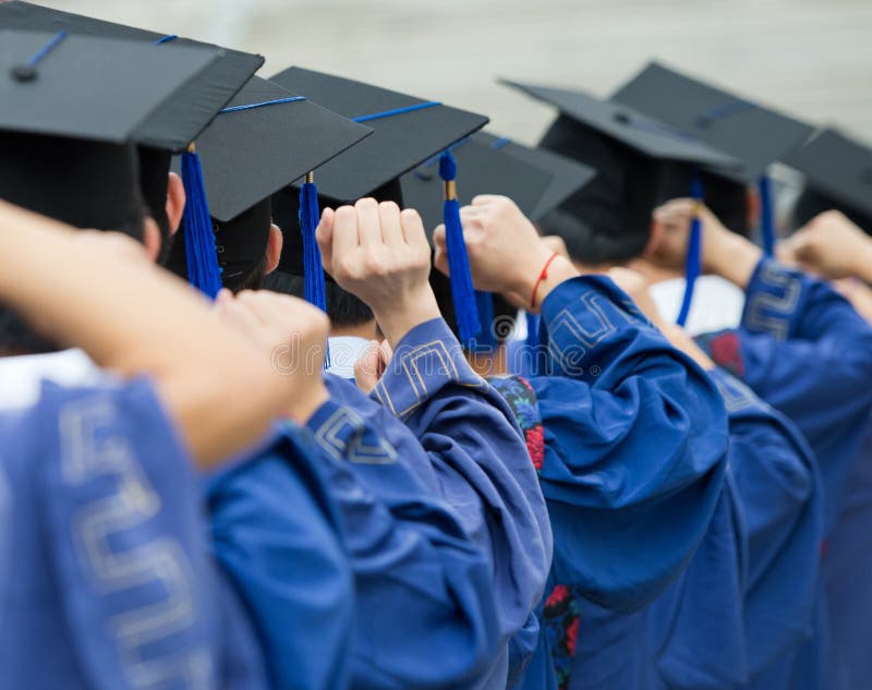 Graduates put hands up stock image. Image of completion - 32532145