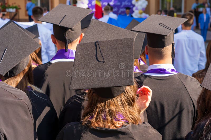 Graduates in Quadrangles. Background with Selective Focus and Copy ...