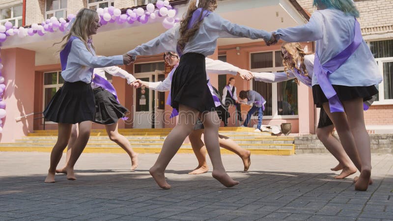 Graduates of the School Twirl in a Round Dance Holding Hands. Stock ...