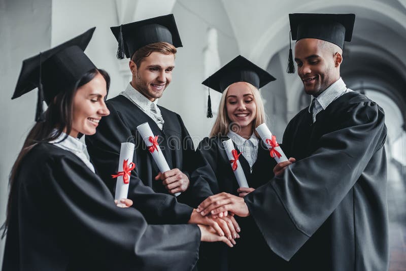 Graduates in university stock image. Image of degree - 98007557
