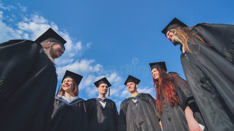 Graduating Students Stand in a Semicircle on a Sunny Summer Afternoon ...