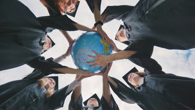 Graduating Students Twirl a Geographic Globe of the World in Their ...