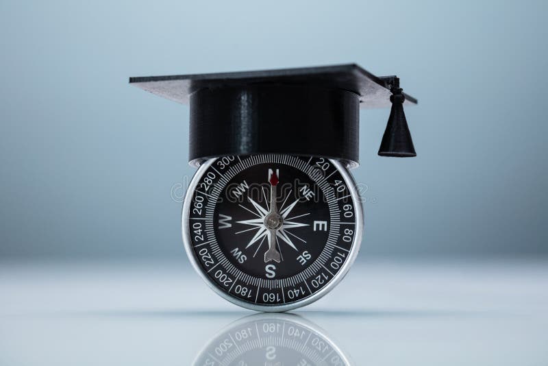 Graduation Cap on Compass stock image. Image of learn - 210617475