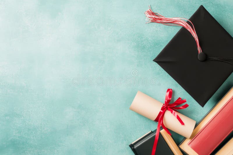 Graduation Cap and Diploma on Stacked Books Against a Teal Backdrop ...