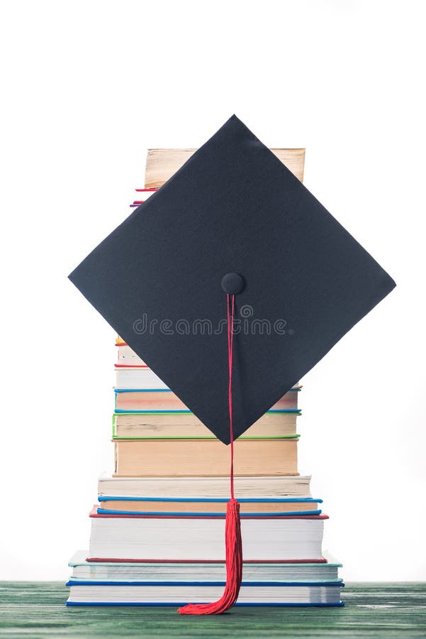 Graduation cap in front of stock image. Image of wisdom - 120917371