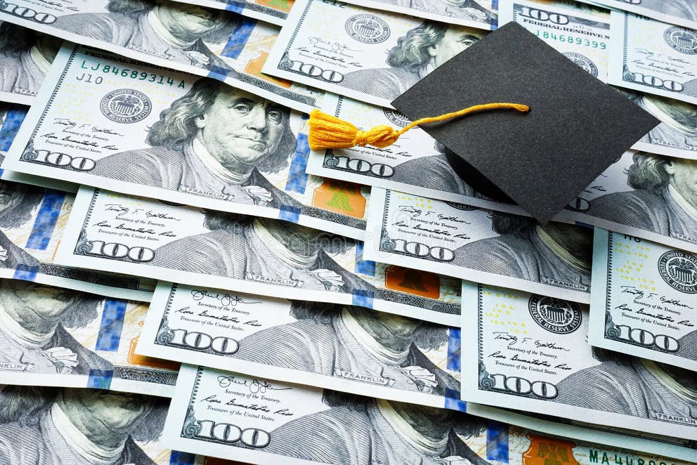 Graduation Cap on the Stack of Money. Student Loan Concept Stock Photo ...