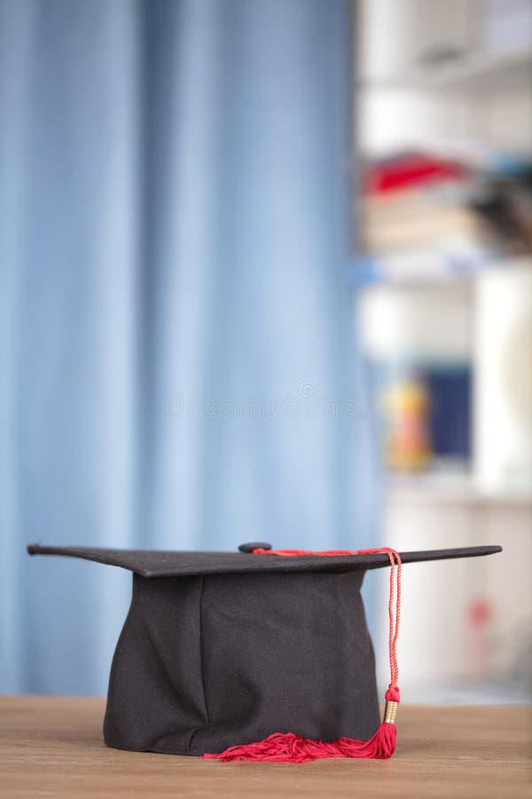 Graduation Cap on the Table Stock Photo - Image of doctor, table: 252867808