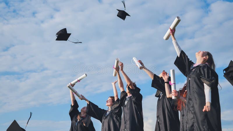 Graduation Caps Thrown in the Air. Stock Photo - Image of celebration ...