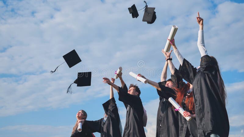 Graduation Caps Thrown in the Air. Stock Photo - Image of student ...