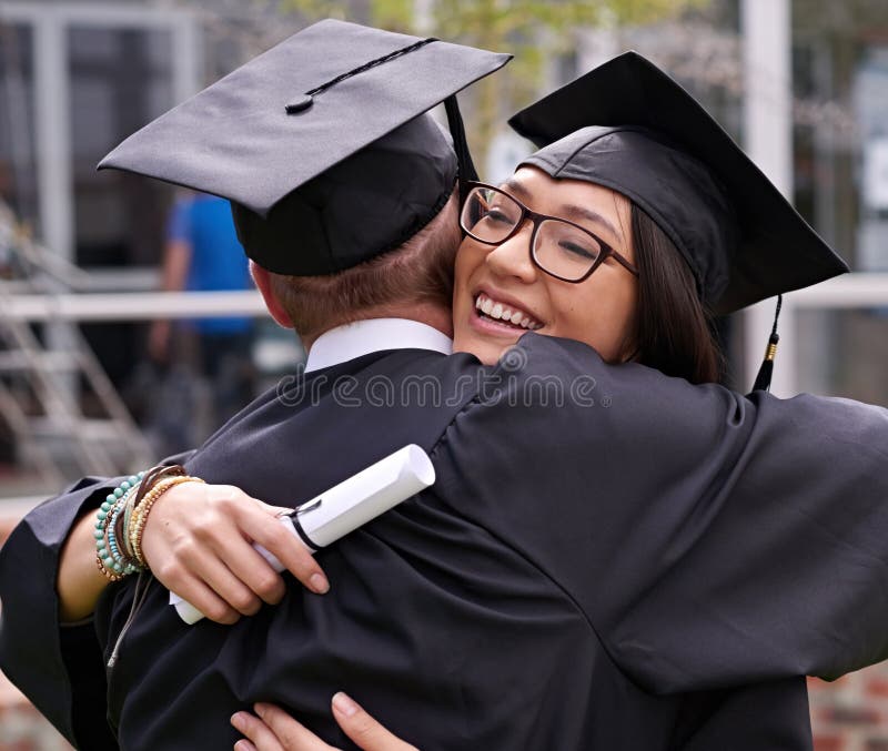 Graduation Congratulations. Two Students Hugging on Graduation Day ...