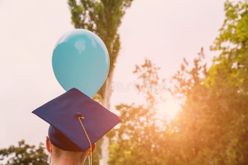 Graduation Day. the Back of a Graduate Wearing Square, Quadrangular ...